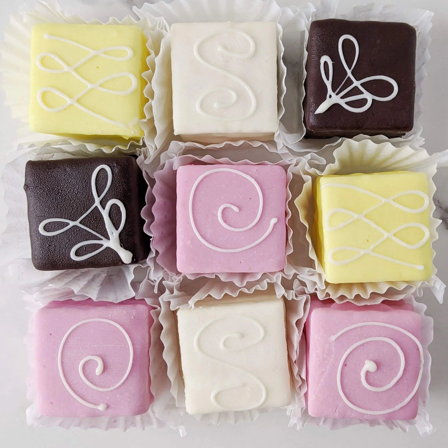 Our all-natural and hand-finished Dragonfly Cakes® and Petits Fours